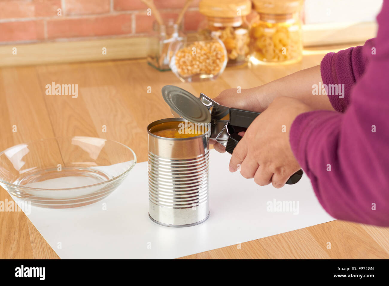 Woman can opener hi-res stock photography and images - Alamy