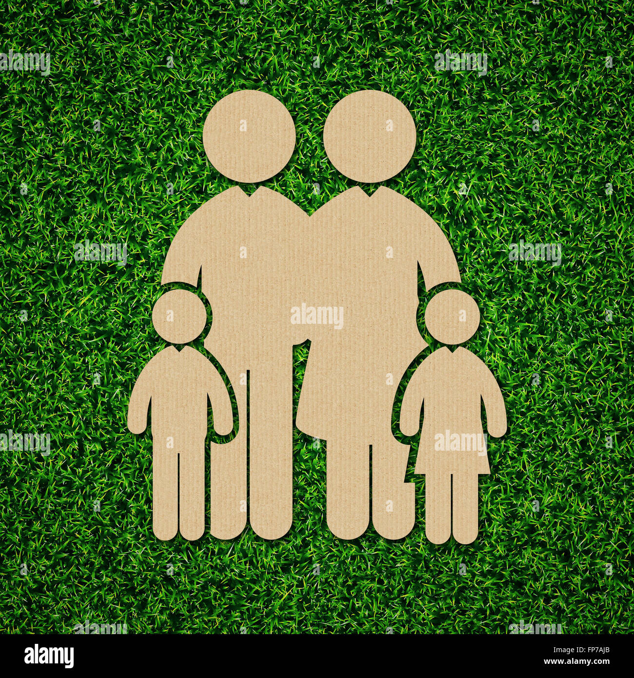 Family concept illustration with cardboard cut out on grass Stock Photo ...