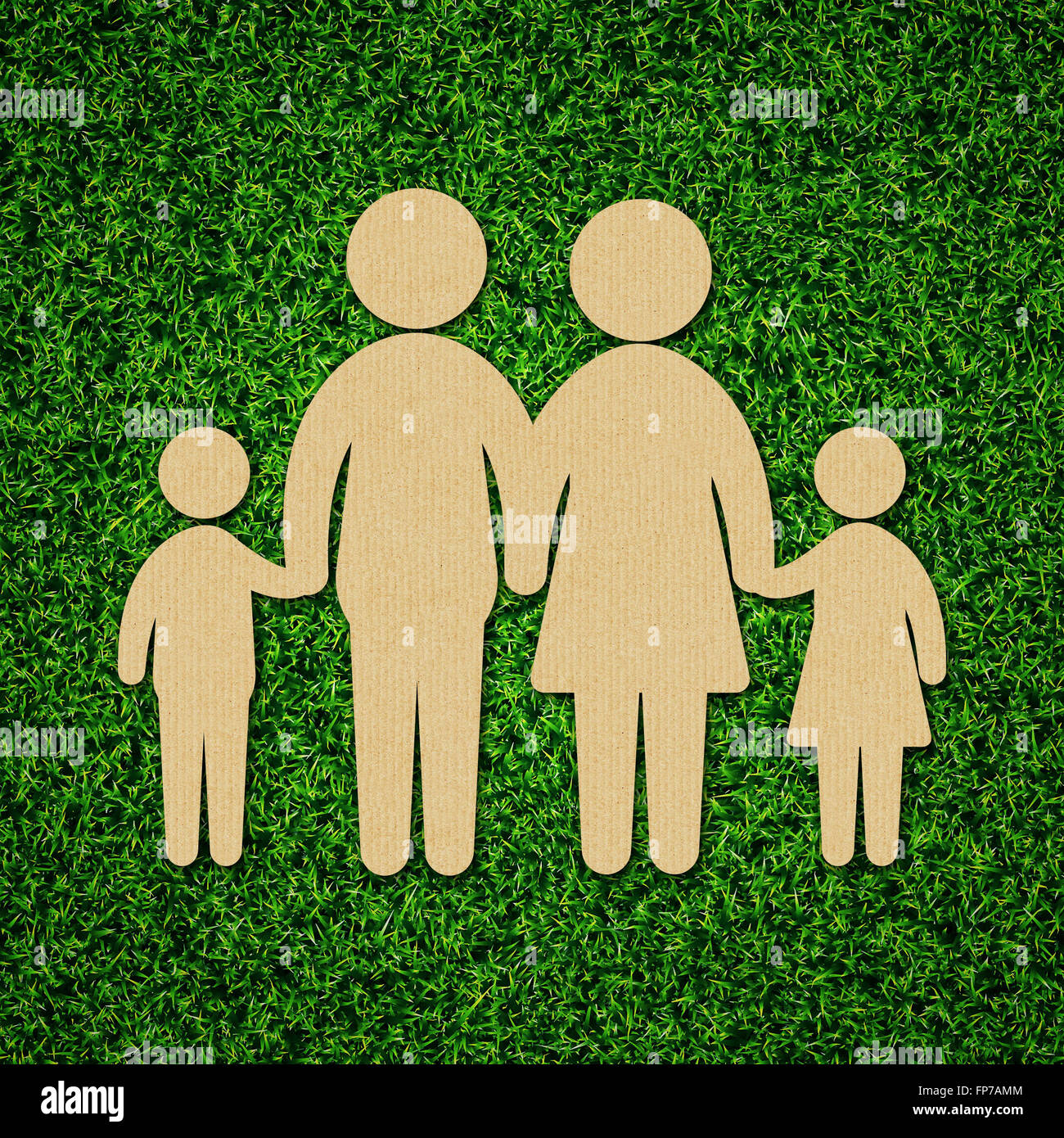 Family concept illustration with cardboard cut out on grass Stock Photo ...
