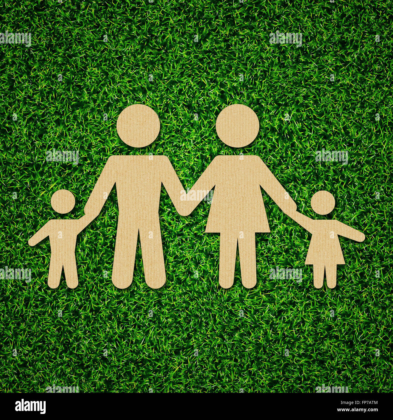 Family concept illustration with cardboard cut out on grass Stock Photo ...