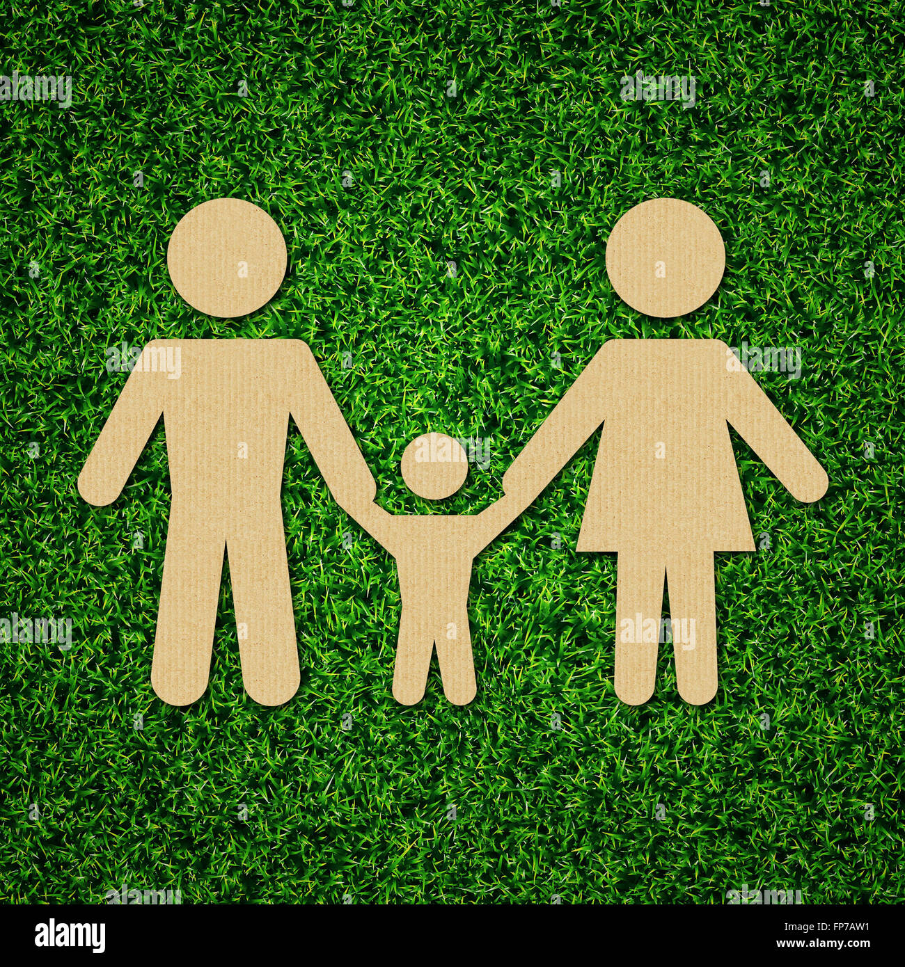Family concept illustration with cardboard cut out on grass Stock Photo ...