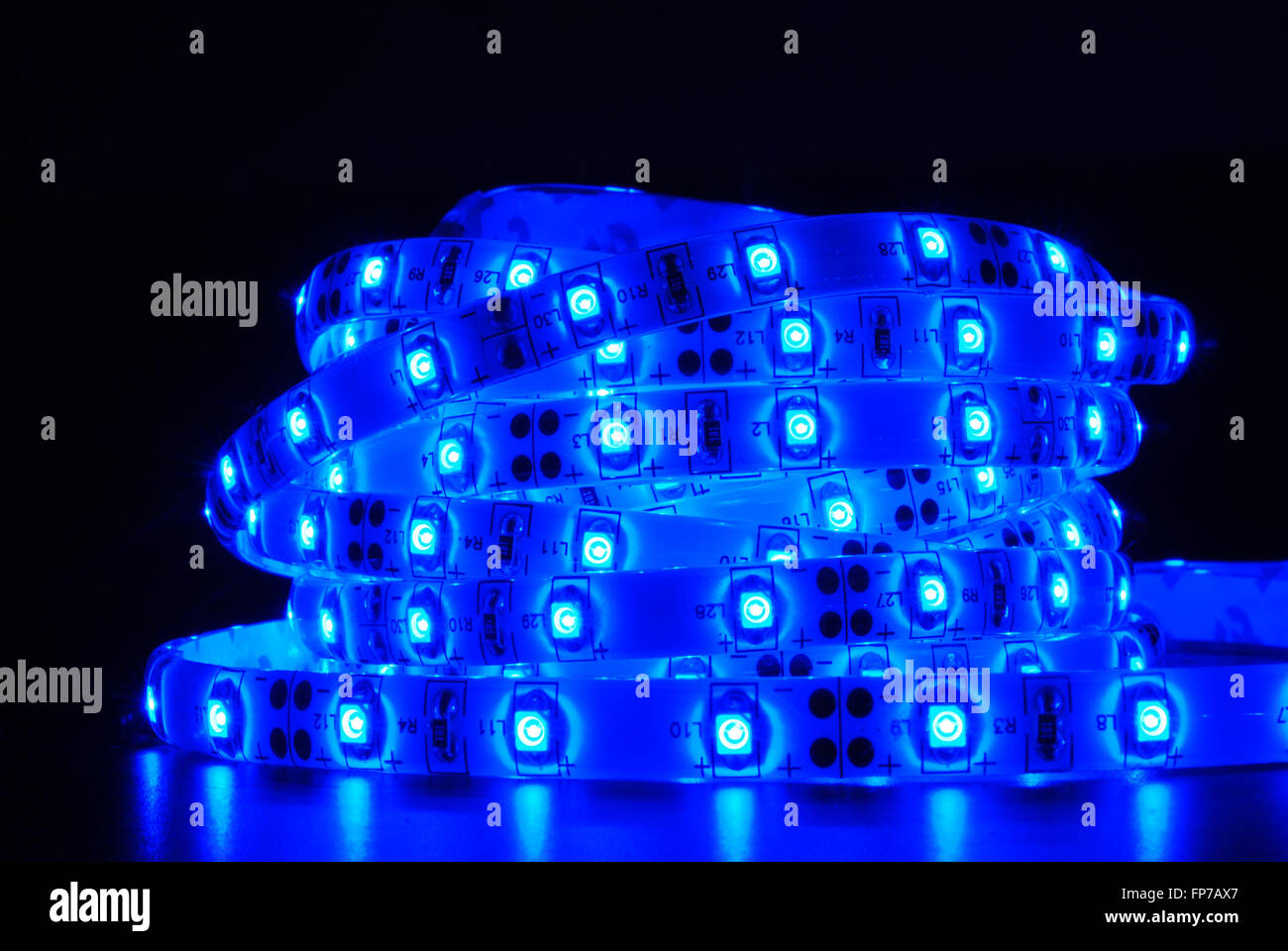 Blue led strip on the black background Stock Photo - Alamy