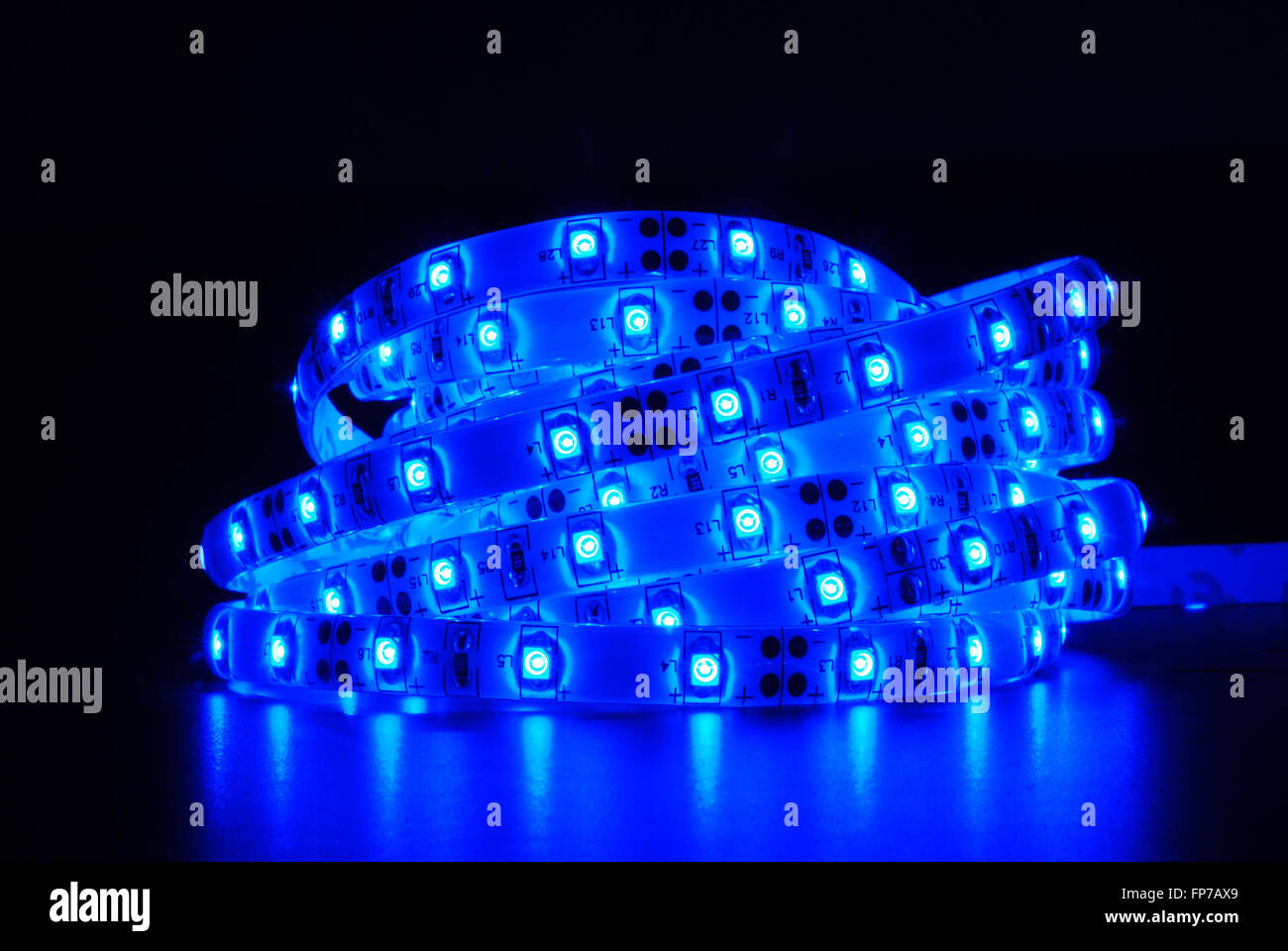 Blue led strip on the black background Stock Photo - Alamy