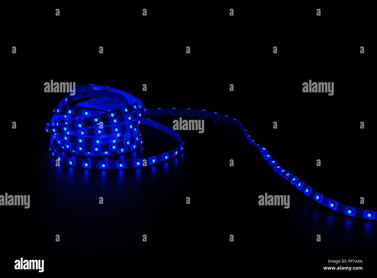Blue led strip on the black background Stock Photo - Alamy