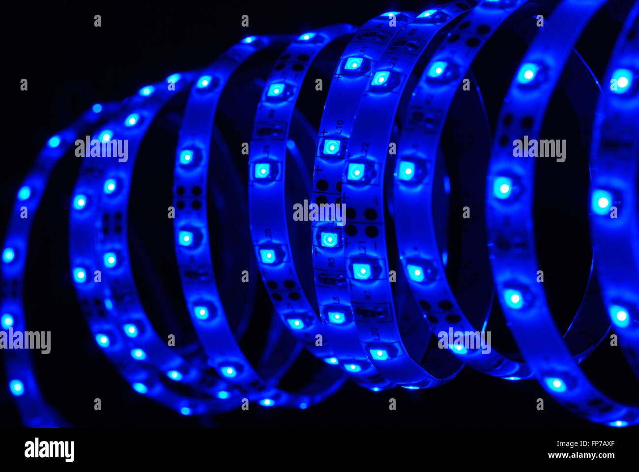 Blue led strip on the black background Stock Photo - Alamy