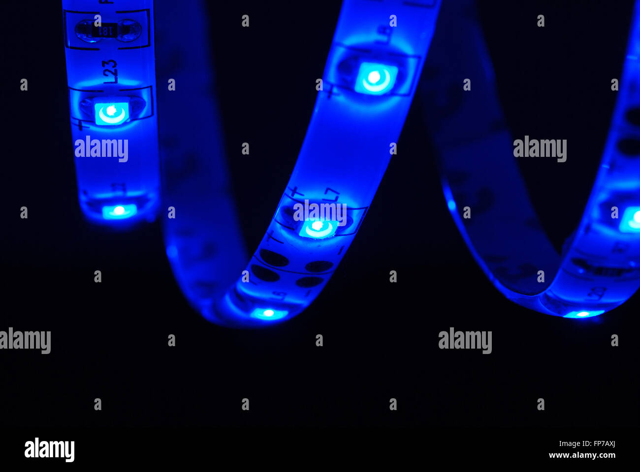 Blue led strip on the black background Stock Photo - Alamy