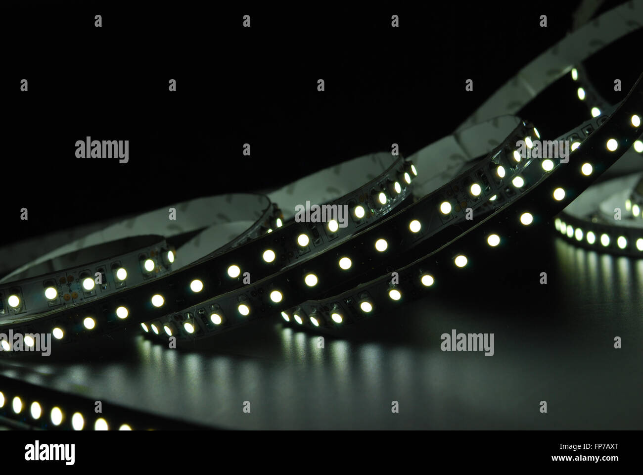 White led strip on the black background Stock Photo - Alamy