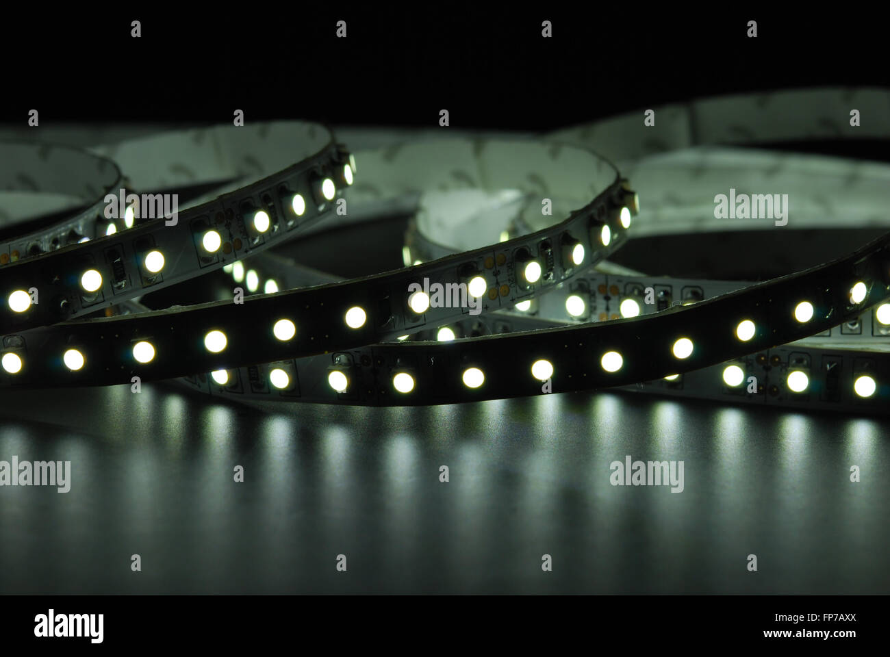 White led strip on the black background Stock Photo - Alamy