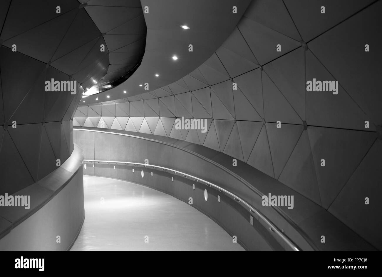 Modern building corridor with curved form. Black and white Stock Photo ...