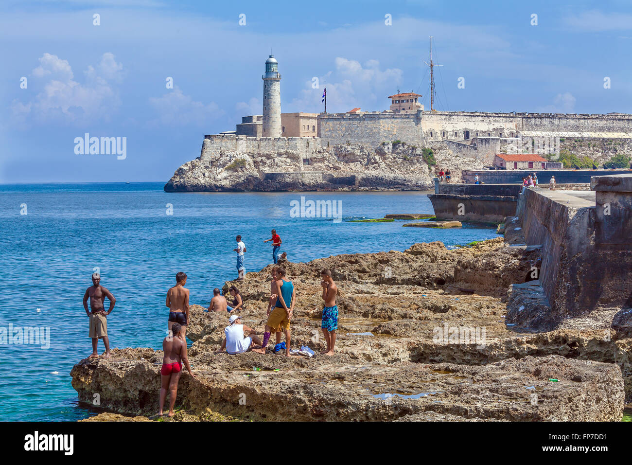HAVANA, CUBA - APRIL 1, 2012: Teenagers swimming in Caribbean sea near ...