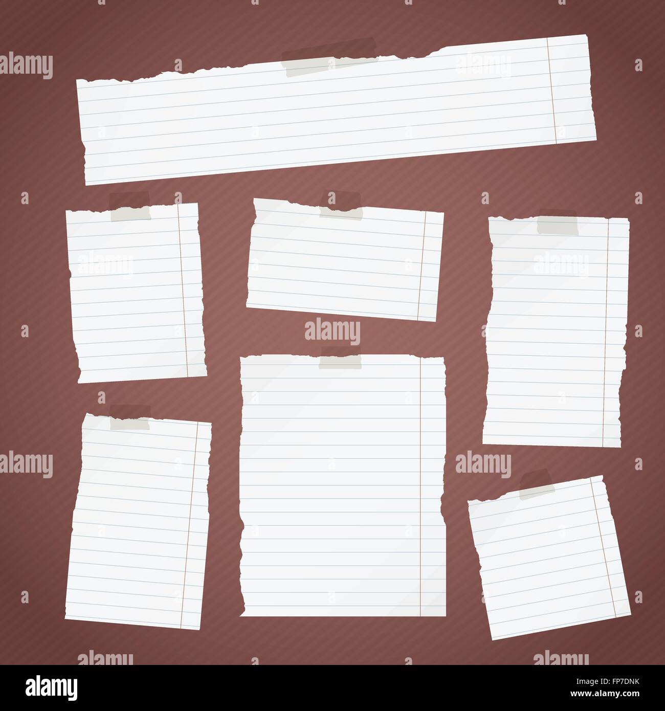 Pieces of torn white lined note paper with sticky tape on diagonal dark ...