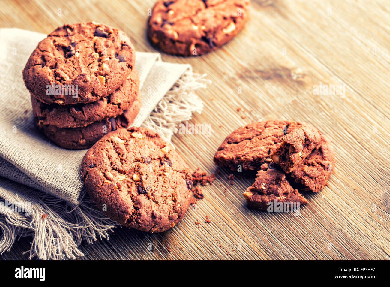 Chocolate biscuit cookies. Chocolate cookies on white linen napkin on ...