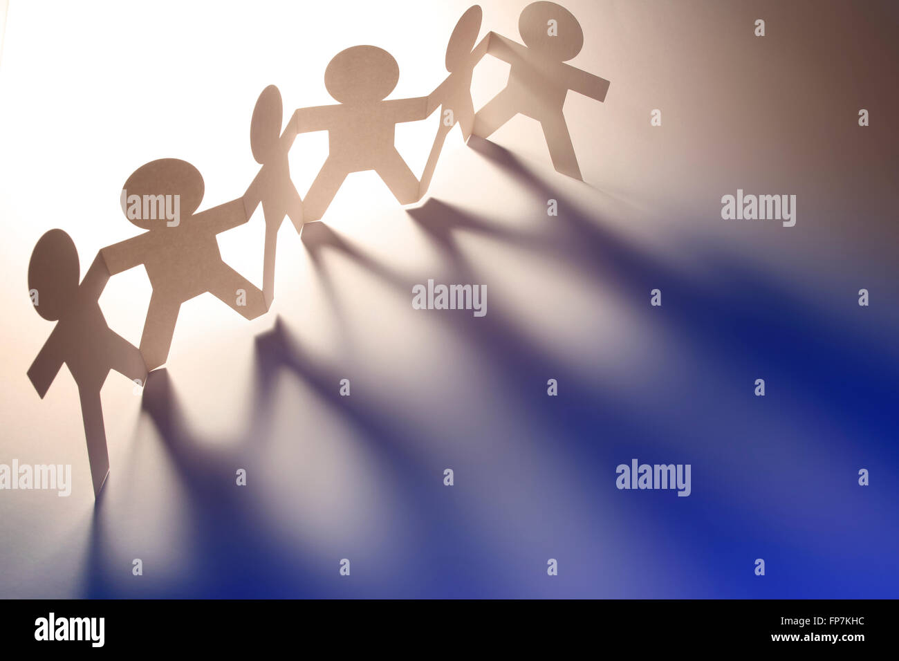 Team of paper doll people Stock Photo - Alamy