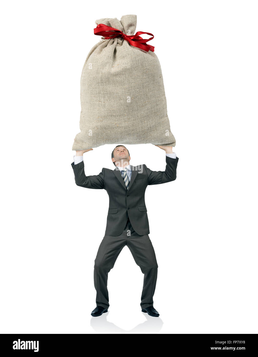 Businessman holding big bag sign isolated on white background Stock ...