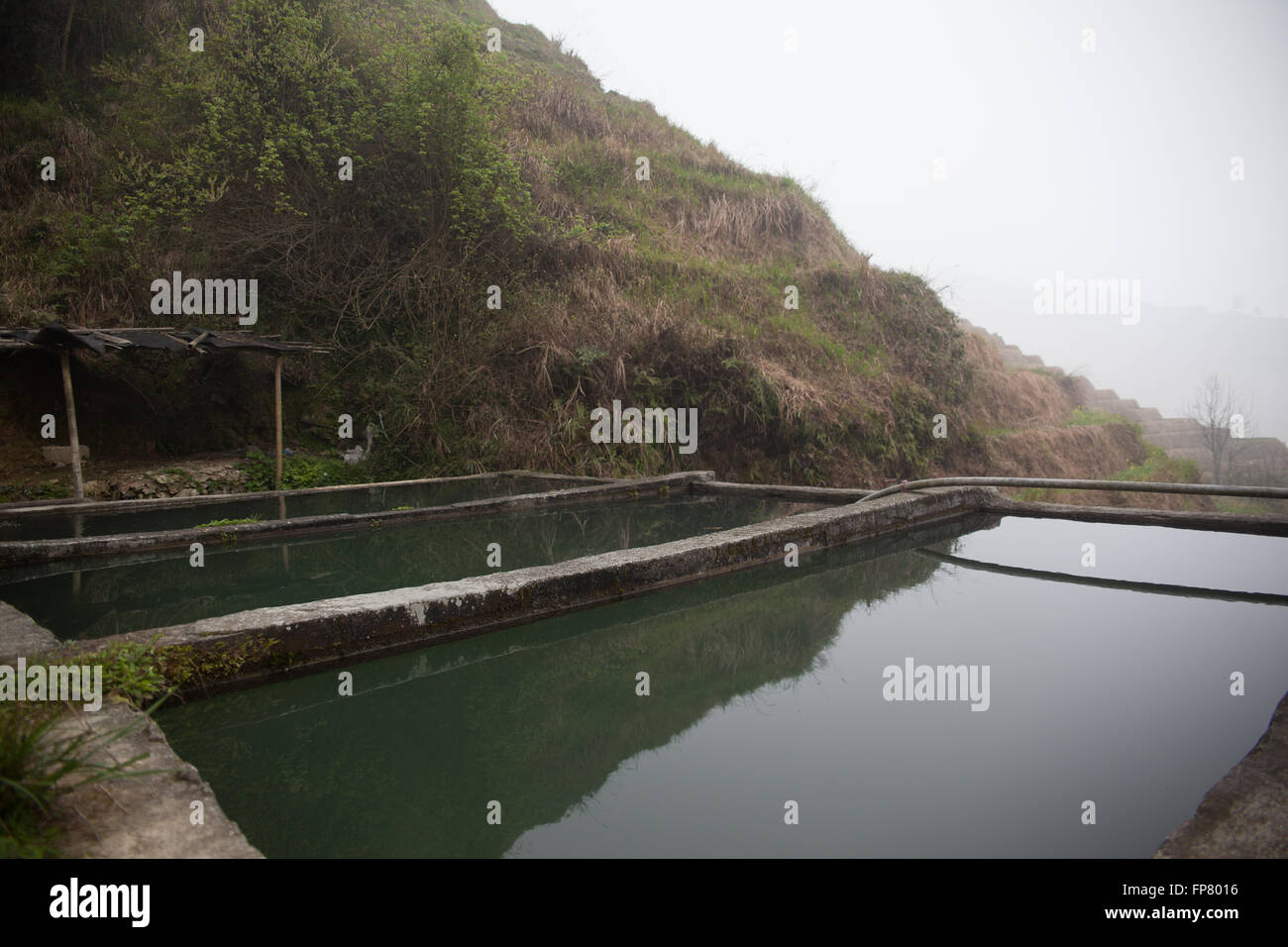 Still Pond By Hill Stock Photo - Alamy