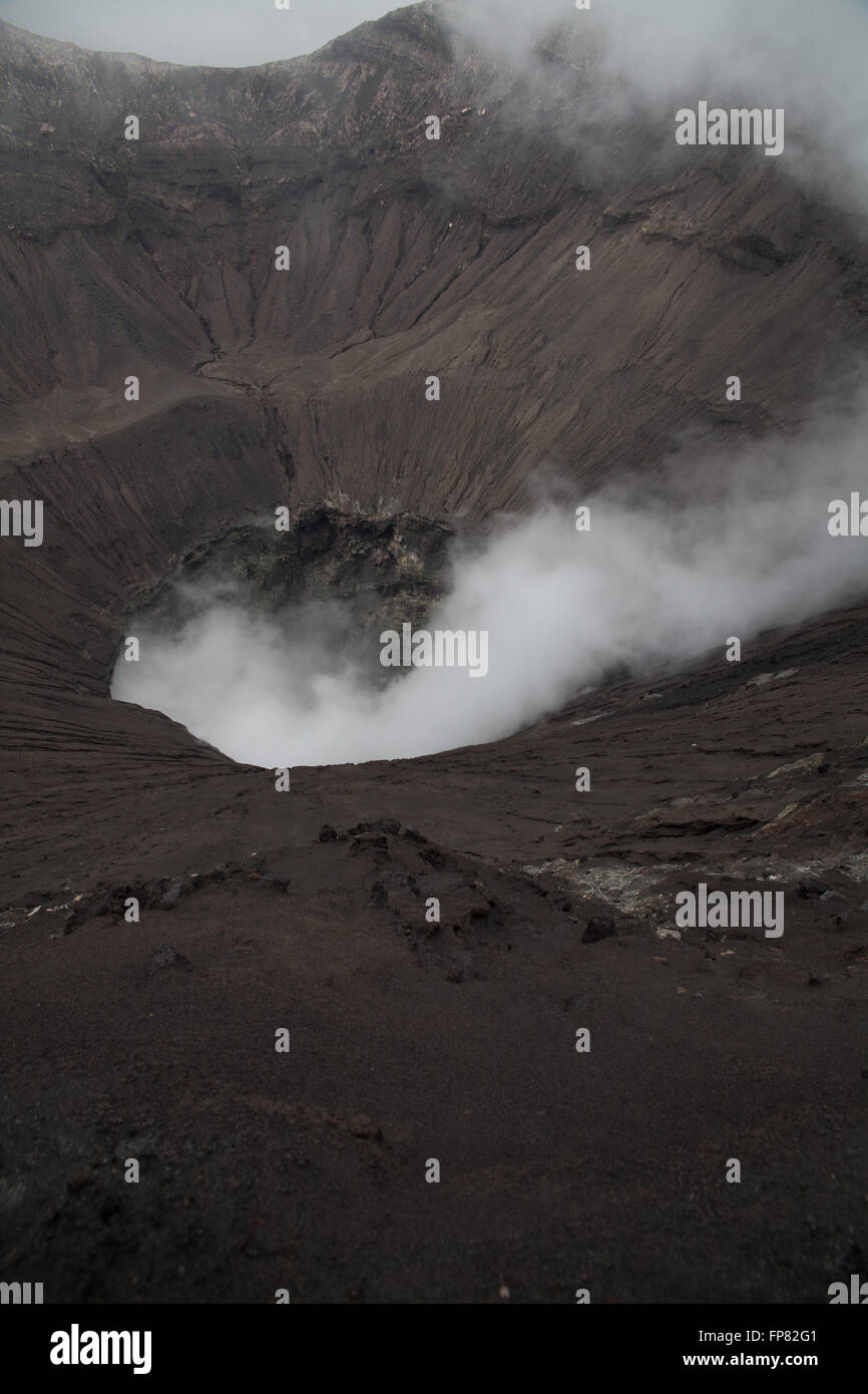 Volcanic Mountain Emitting Smoke Stock Photo - Alamy