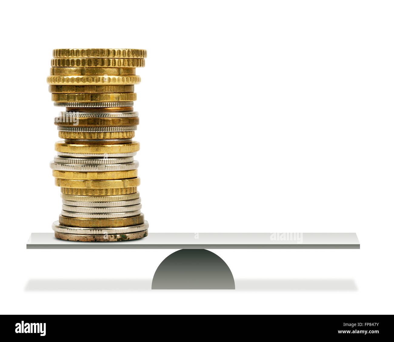Stack of coins on scales isolated on white background Stock Photo - Alamy