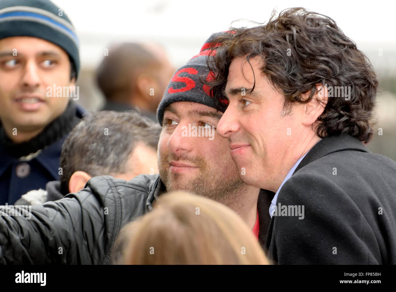 Posing for photo with celebrity hi-res stock photography and images - Alamy