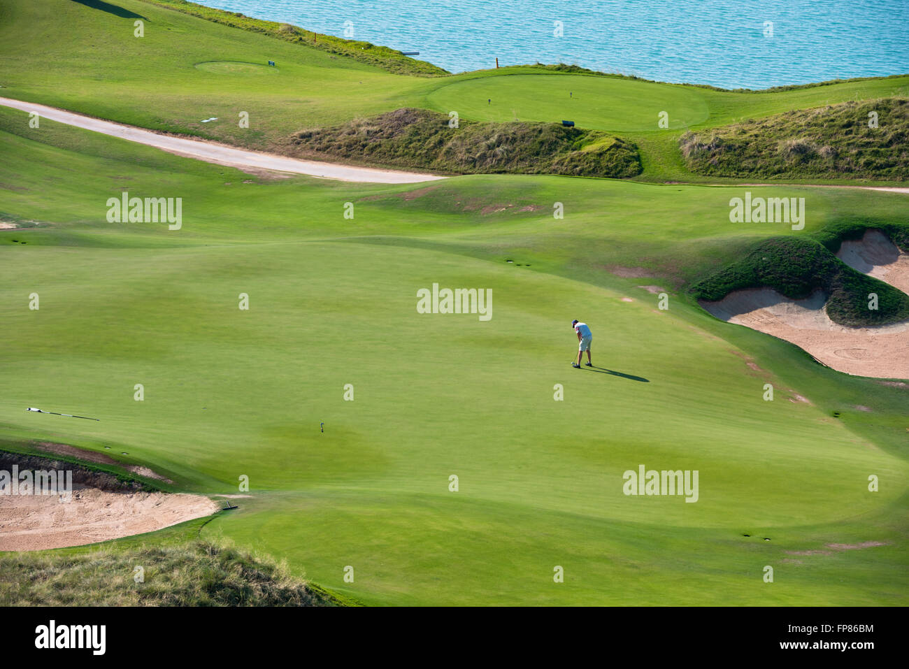 View of green golf resort field. summer vacations Stock Photo - Alamy