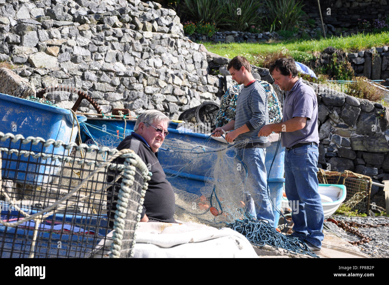 Mending nets hi-res stock photography and images - Alamy