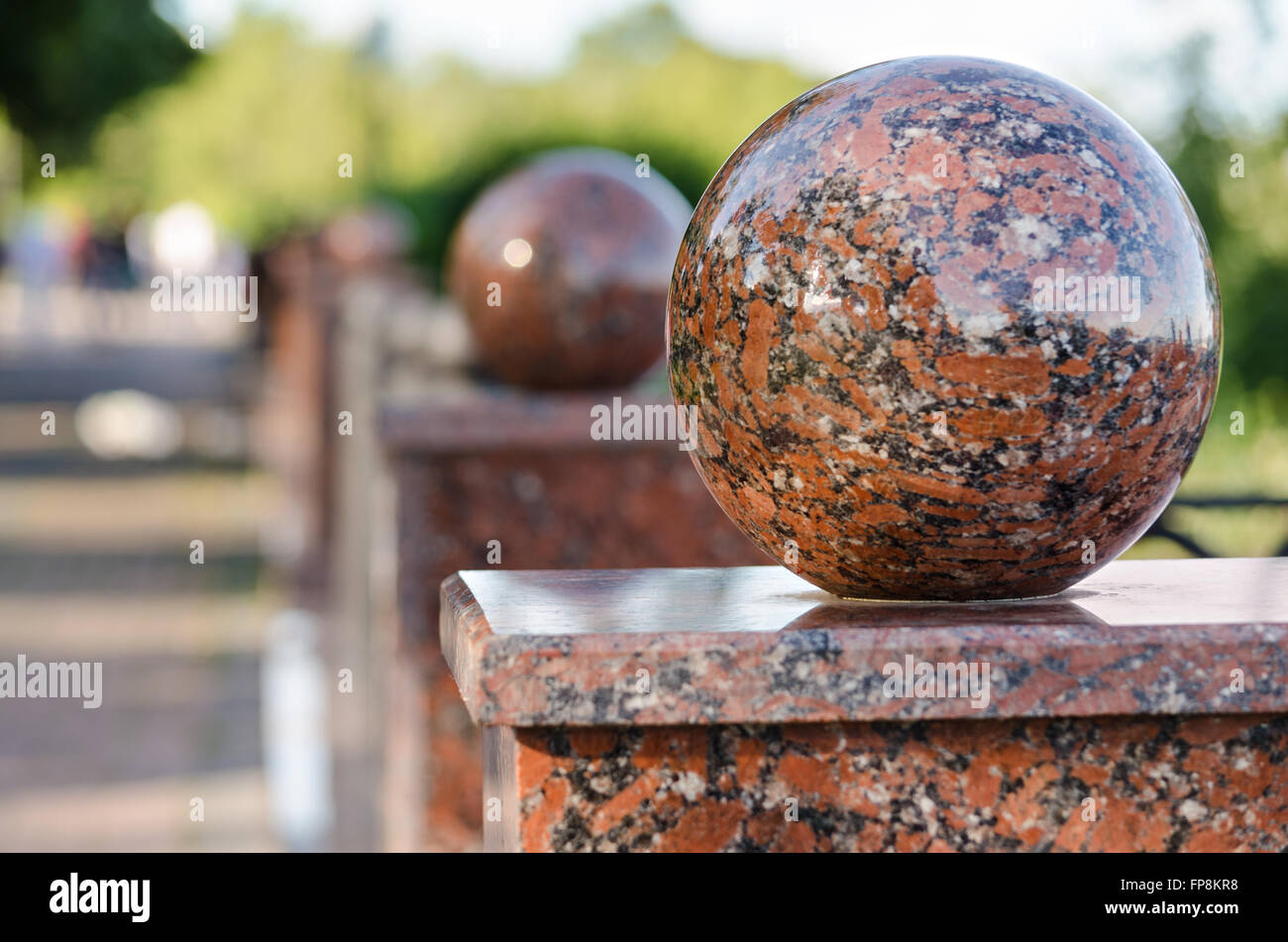 Granite balls at the city fence Stock Photo - Alamy