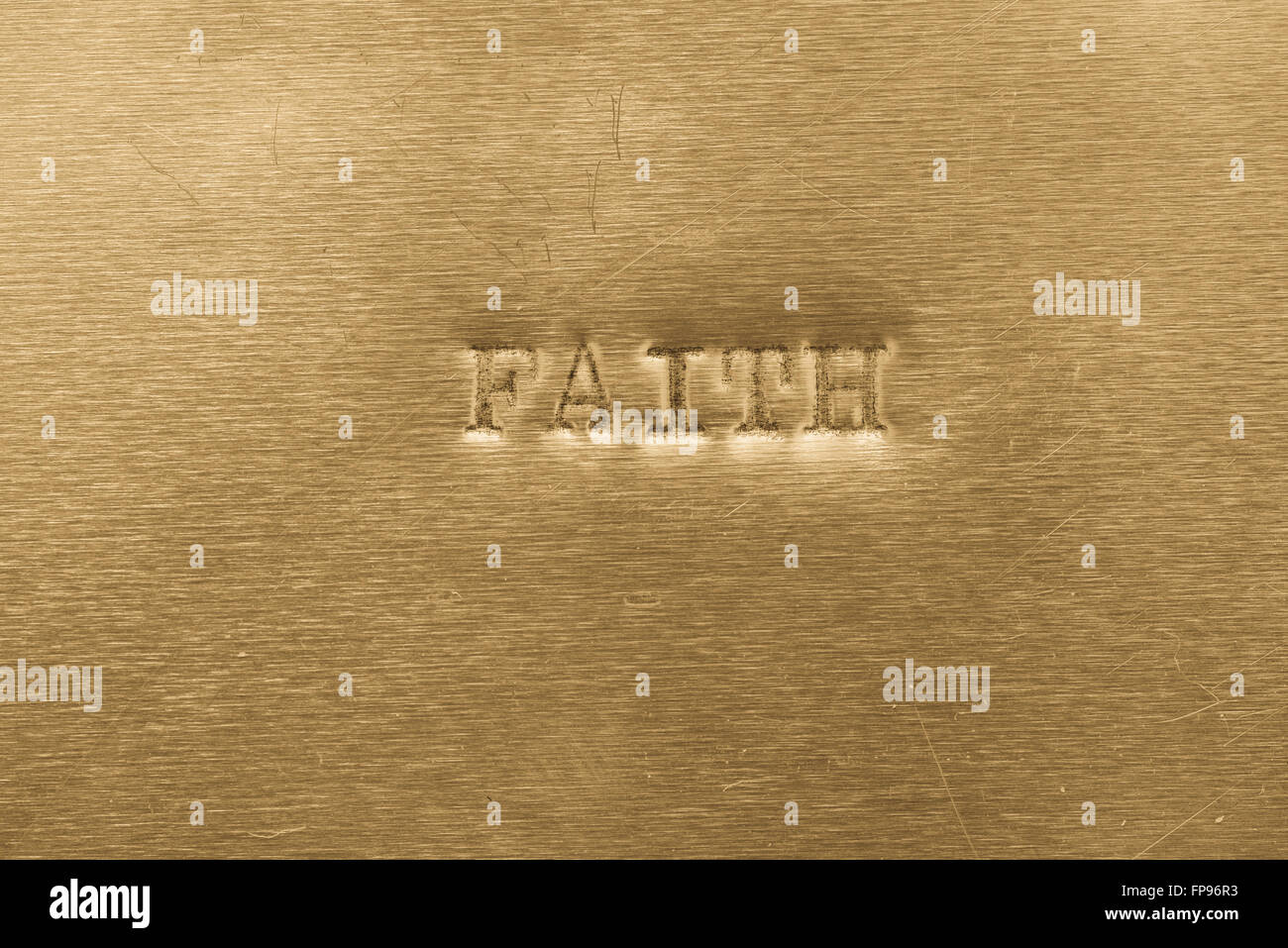 word faith printed on golden metallic background Stock Photo - Alamy