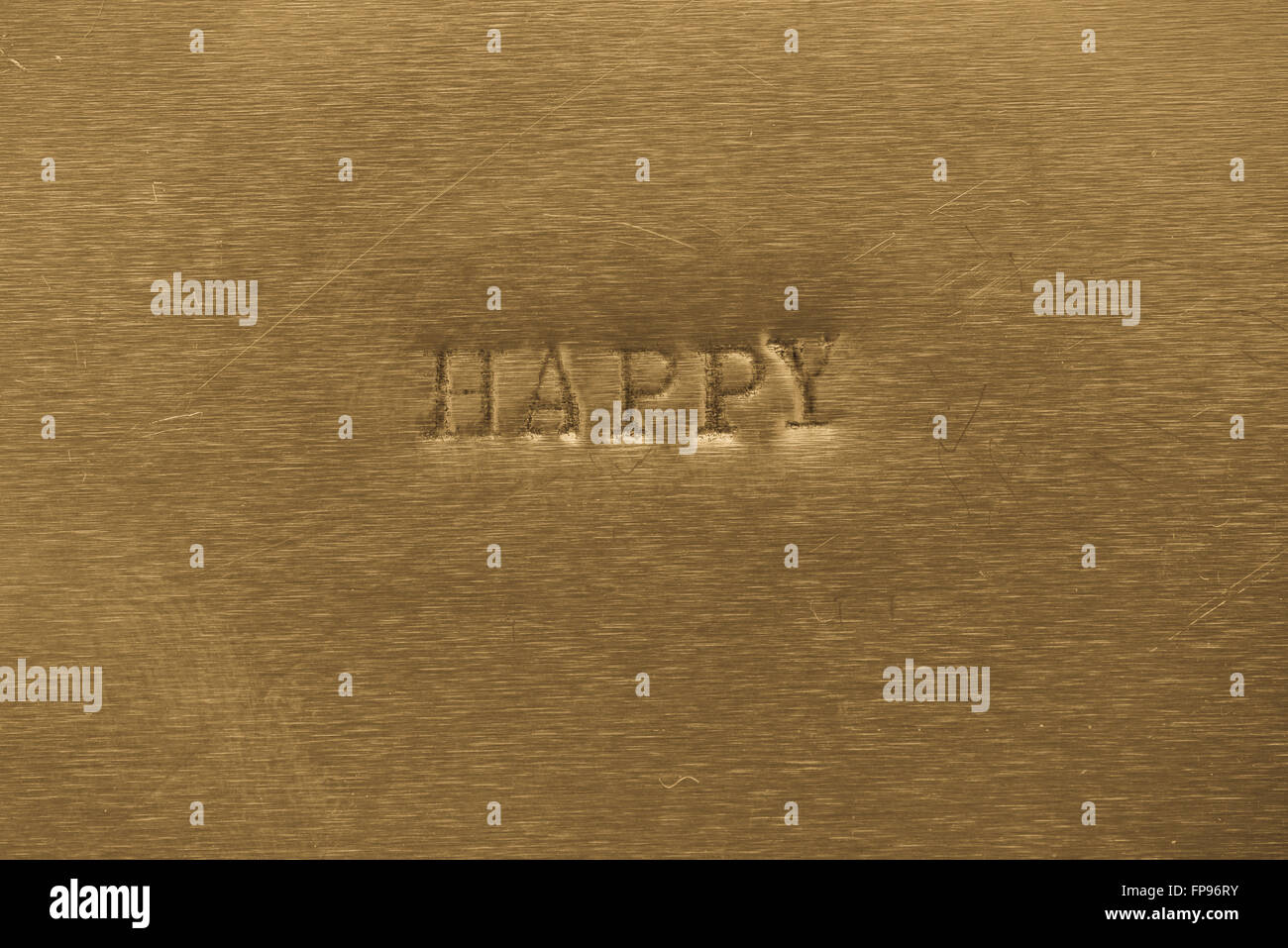 word happy printed on golden metallic background Stock Photo - Alamy