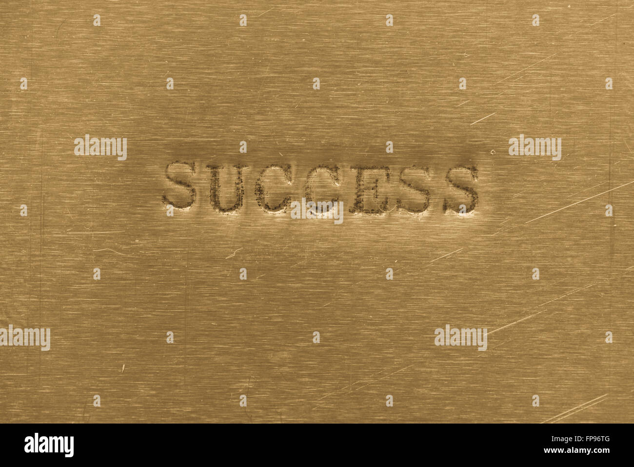 word success printed on golden metallic background Stock Photo - Alamy
