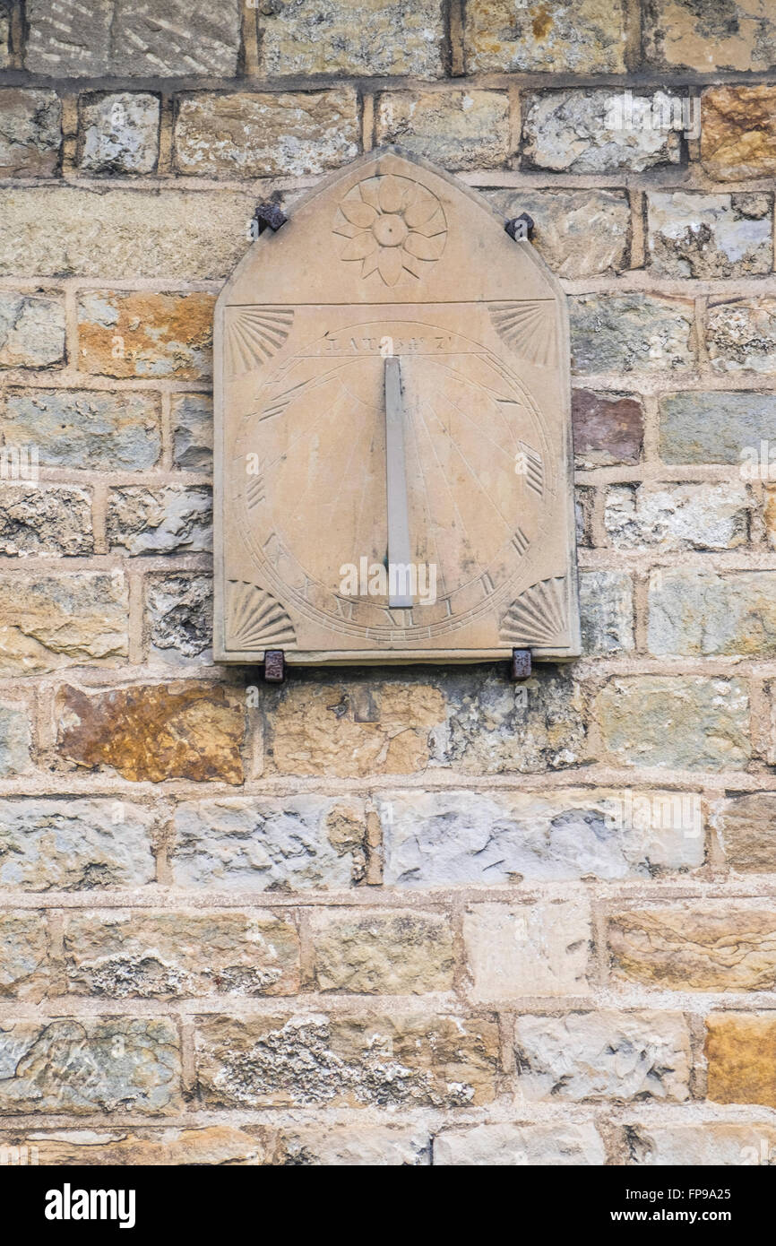 Medieval Sun Dial wall clock-plaque Stock Photo - Alamy