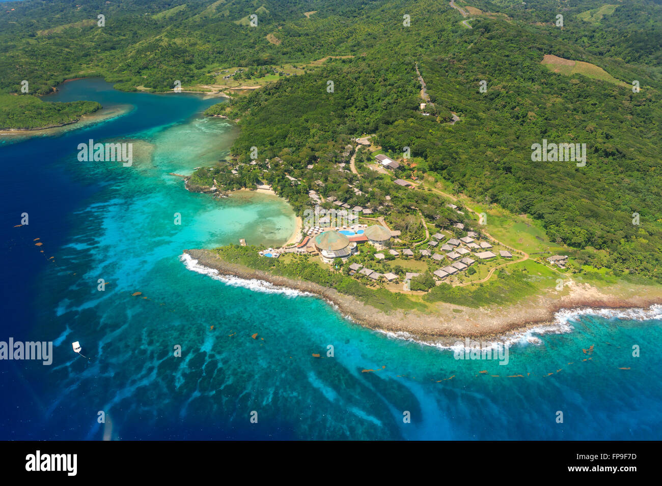 Aerial image of Roatan island town and reef Stock Photo - Alamy