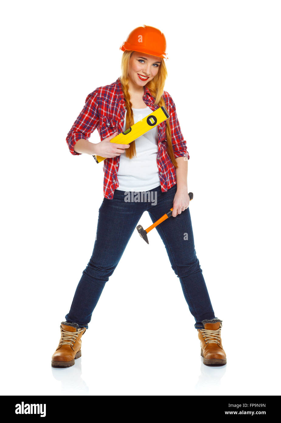 Young woman in helmet with the work tools on a white background Stock ...