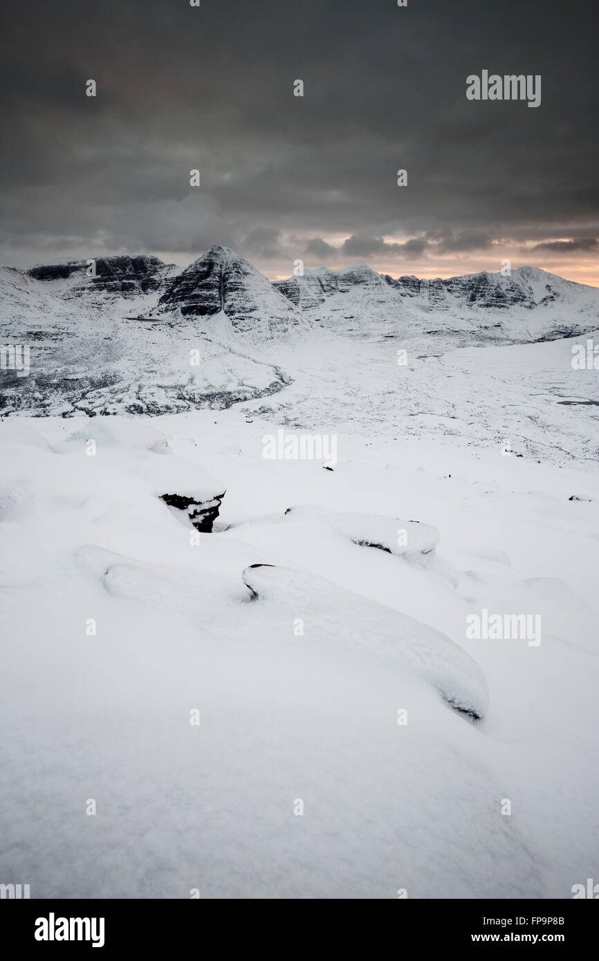 Beinn Eighe and Liathach seen after heavy snowfall at sunset, Torridon ...