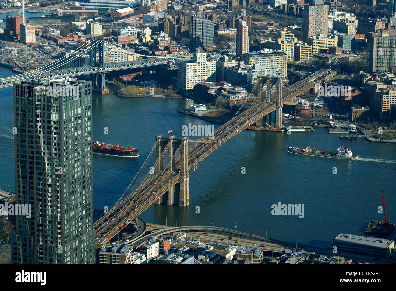 Aerial view of Manhattan Bridge and Brooklyn Bridge over East River ...