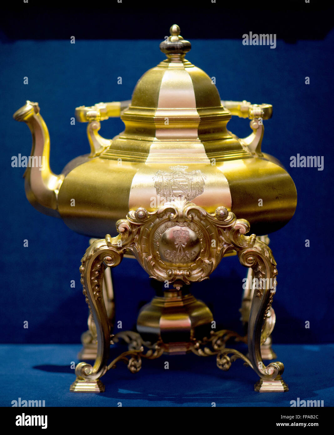 Moritzburg, Germany. 18th Mar, 2016. A golden tea kettle being ...