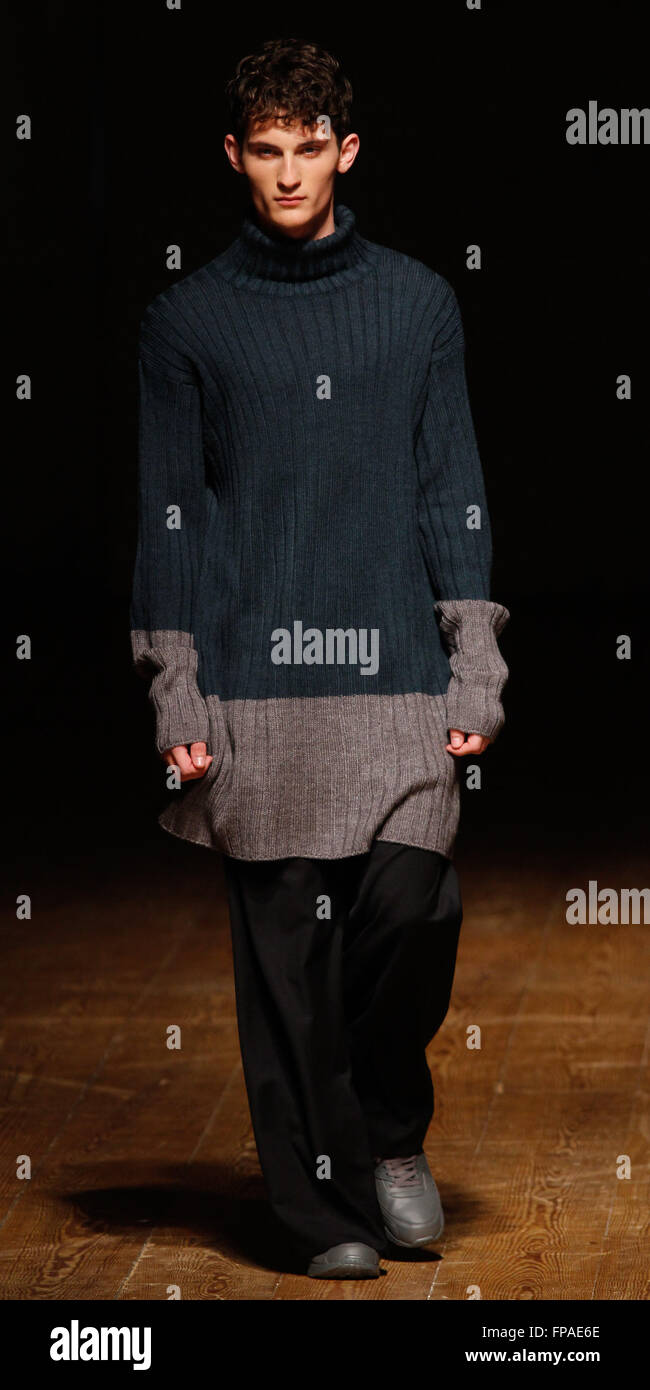 Porto, Portugal. 18th Mar, 2016. A model displays a creation of ...