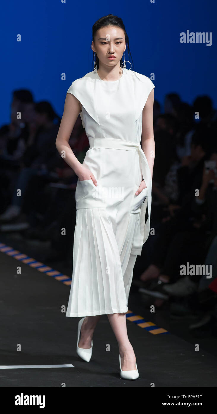 Beijing, China. 18th Mar, 2016. A model presents a creation designed by ...