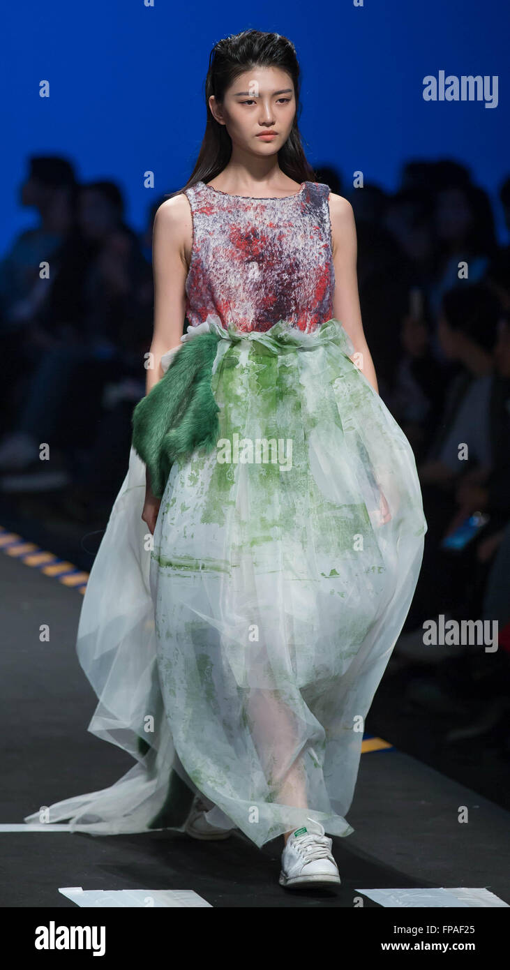 Beijing, China. 18th Mar, 2016. A model presents a creation designed by ...