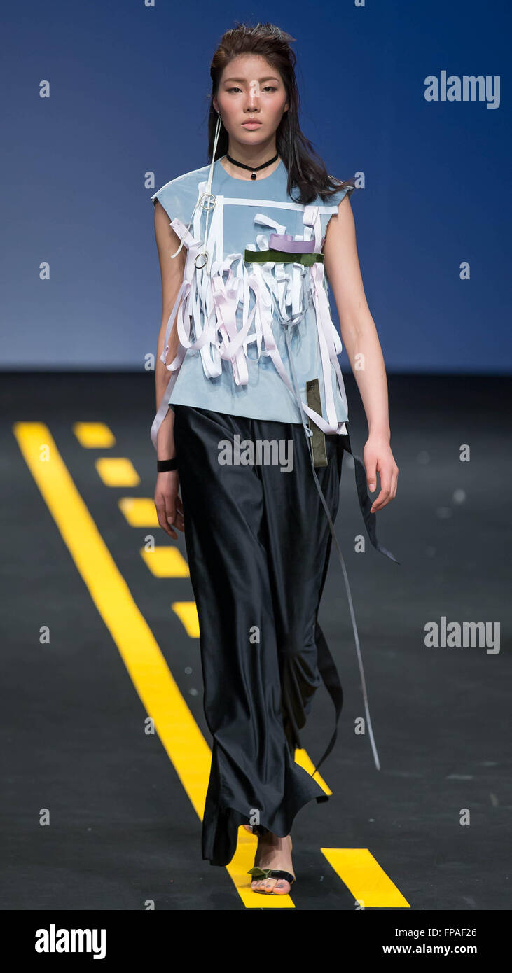 Beijing, China. 18th Mar, 2016. A model presents a creation designed by ...