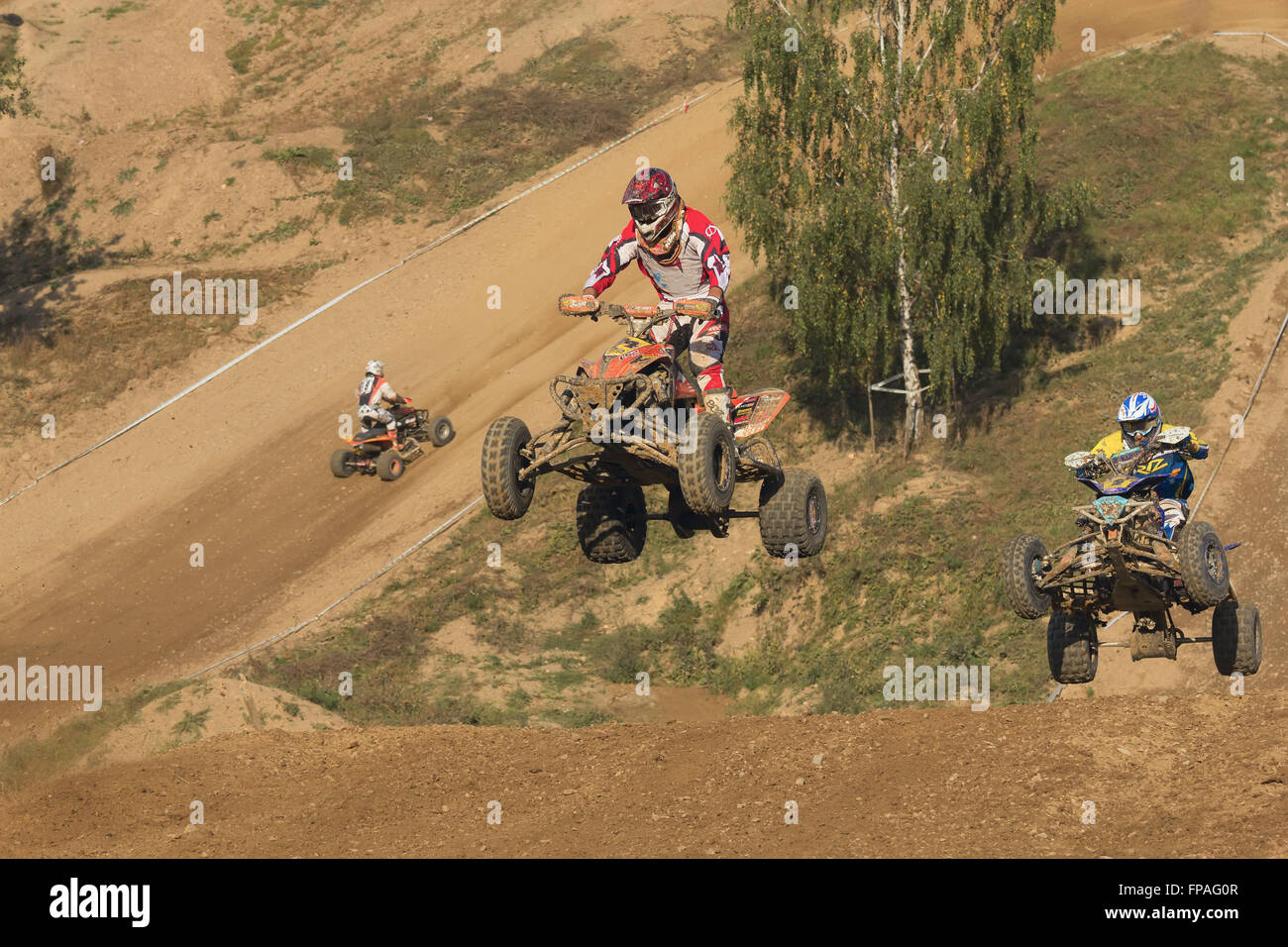 Racers in the quad race Stock Photo - Alamy