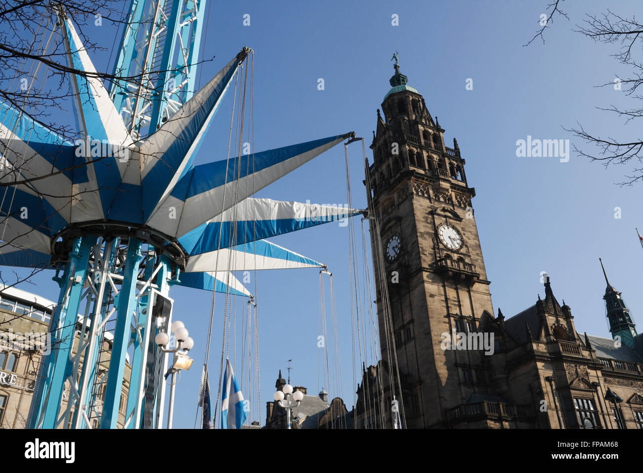 City Centre fair ground carousel and Sheffield town hall clock tower ...