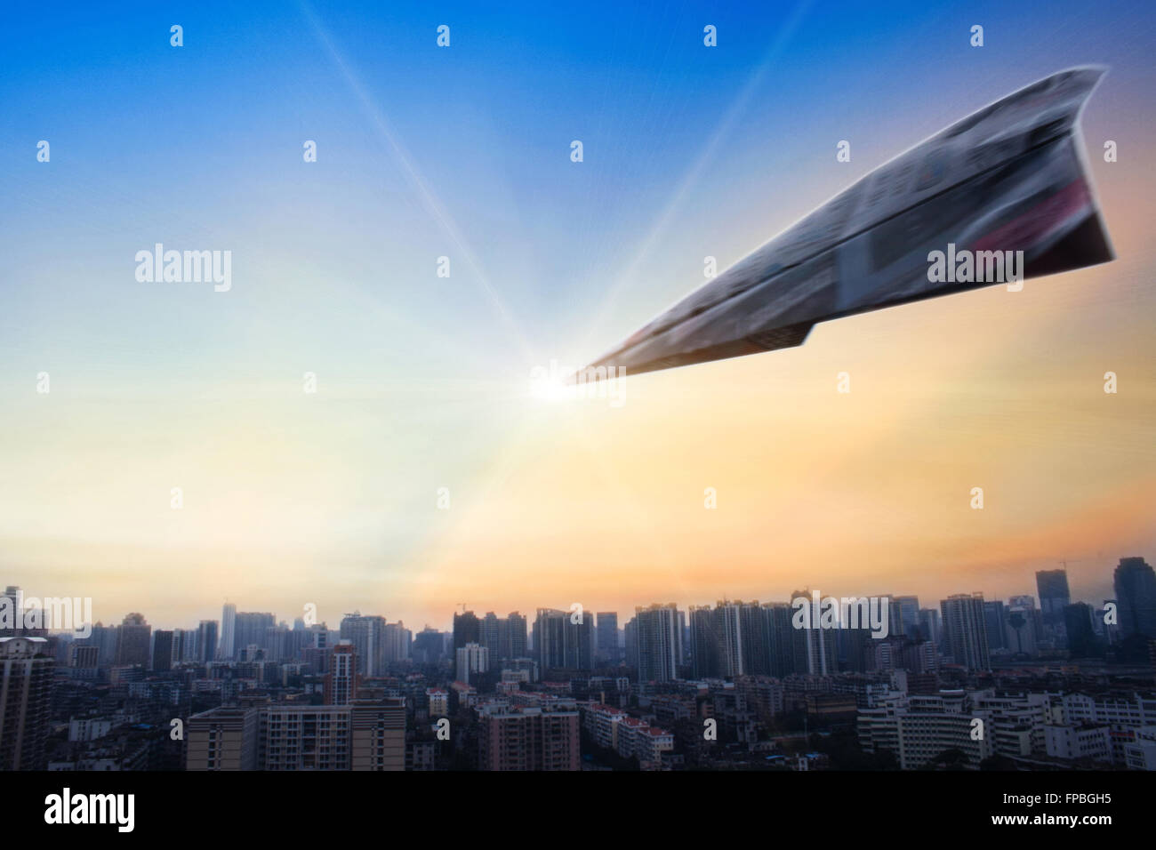 fly a paper airplane Stock Photo - Alamy