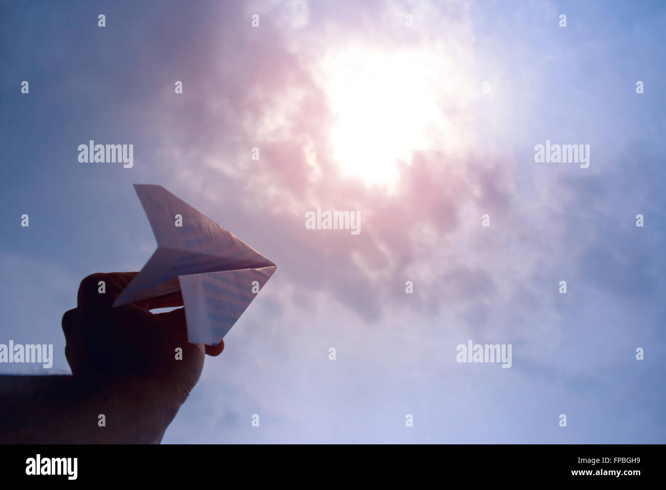 fly a paper airplane Stock Photo - Alamy