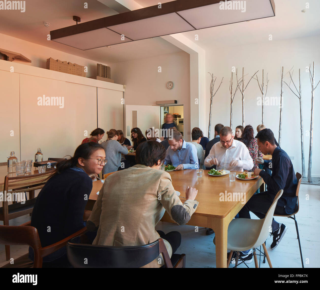 Lunch gathering in multifunctional meeting room. DSDHA architectural ...