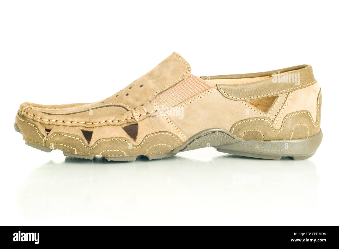 Modern beige mens moccasin over white background Stock Photo - Alamy