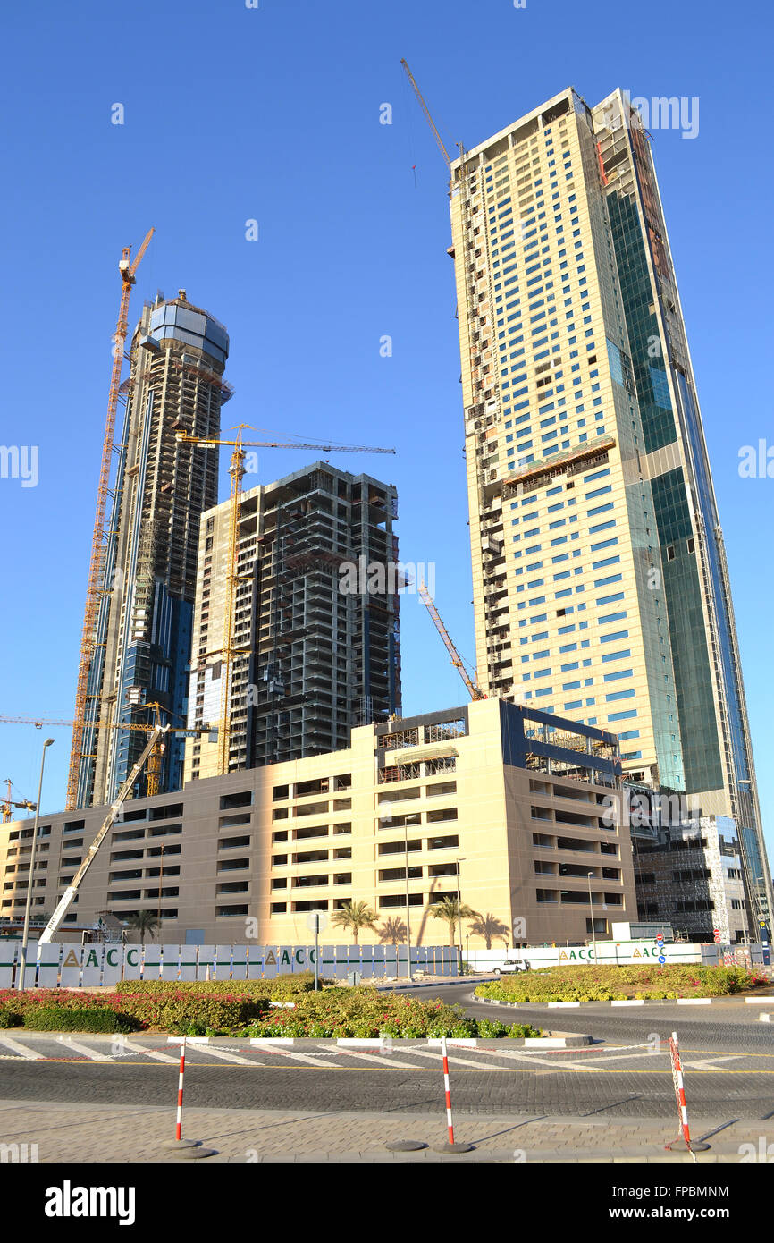 Highrise buildings under construction in Dubai Stock Photo - Alamy