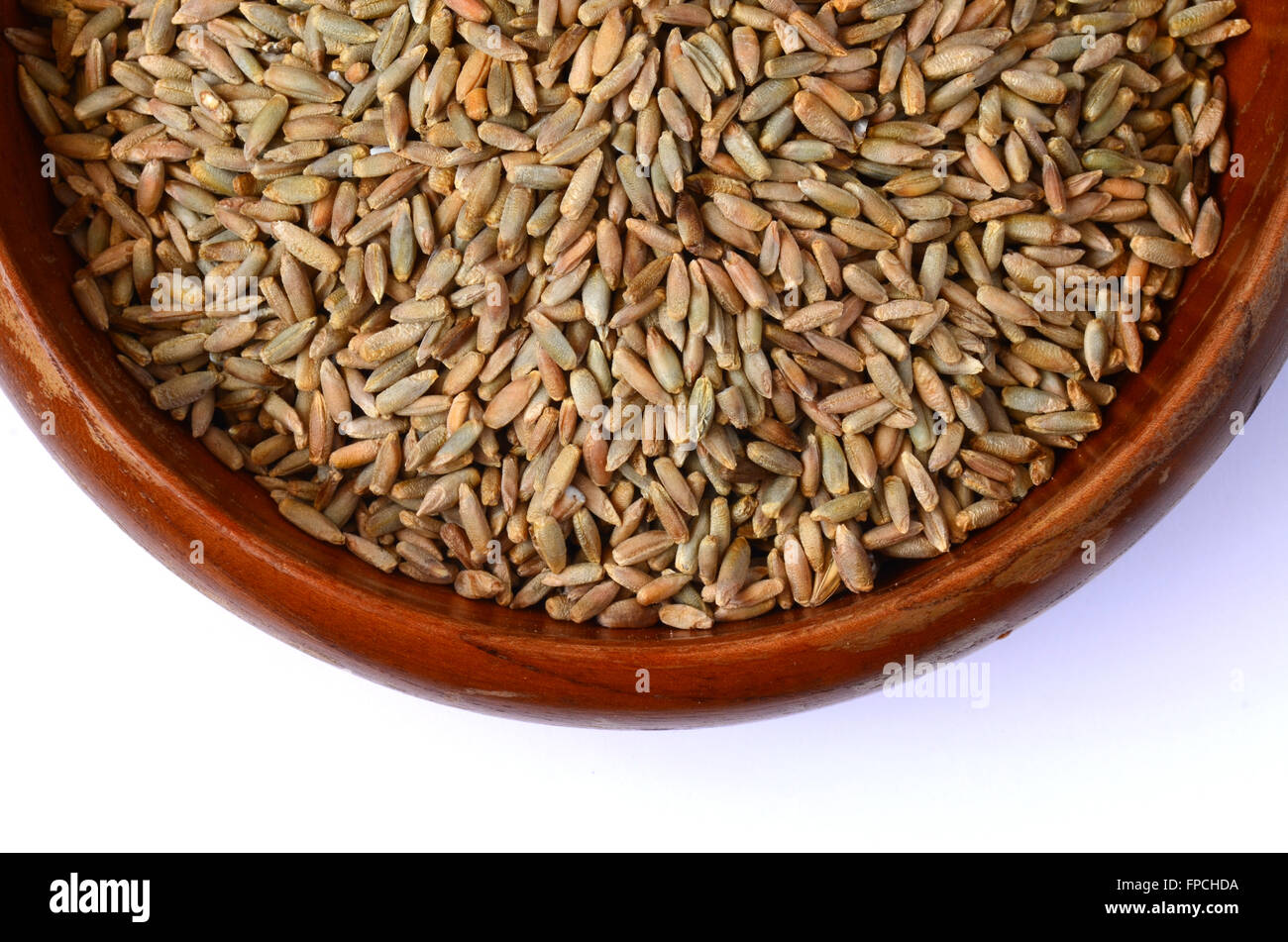 Uncooked rye grain seeds close up shot Stock Photo - Alamy