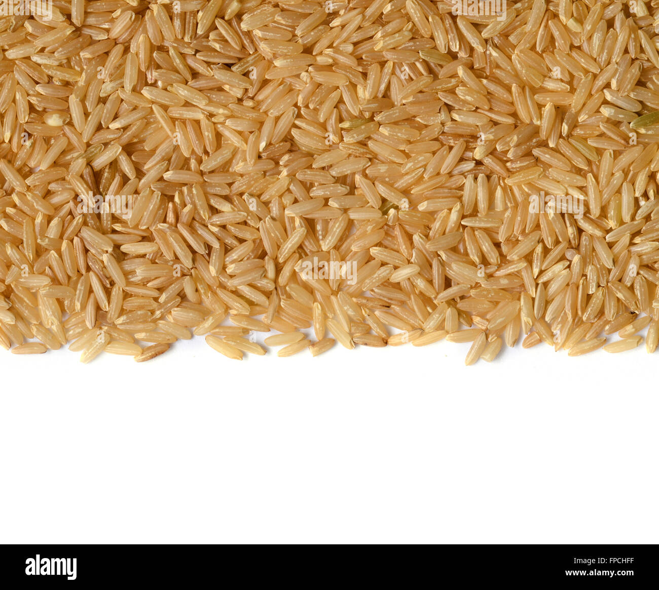 Healthy brown rice uncooked, close up shot Stock Photo - Alamy