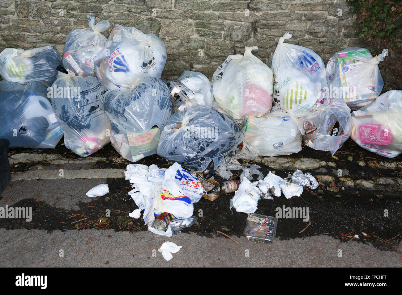 Roadside rubbish bags hi-res stock photography and images - Alamy