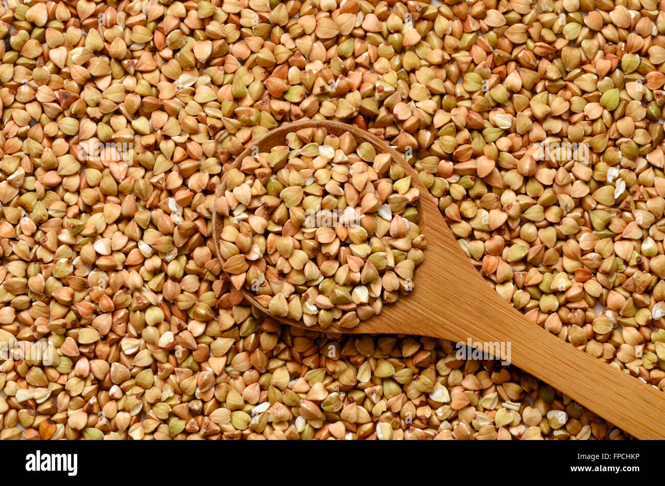 Uncooked buckwheat seeds close up shot Stock Photo - Alamy