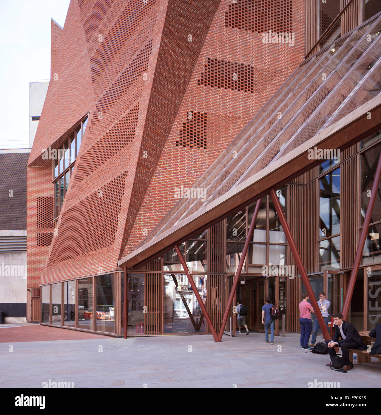 The sharp angled brickwork and glass entrance of the LSE Student Centre ...